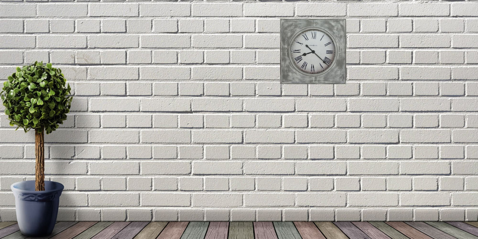 wall clock on white wall